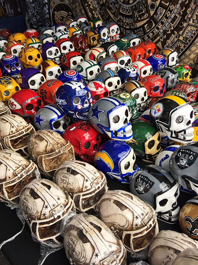 Sports team loyalty meets D&iacute;a de los Muertos artistry. These colorful skull creations prove that fandom and folk art make surprisingly perfect teammates.