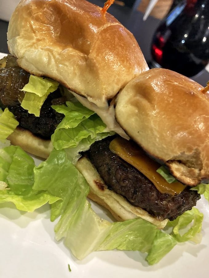 These aren't just burgers&mdash;they're handheld happiness. The pillowy bun embraces a perfectly seasoned patty like they were made for each other.