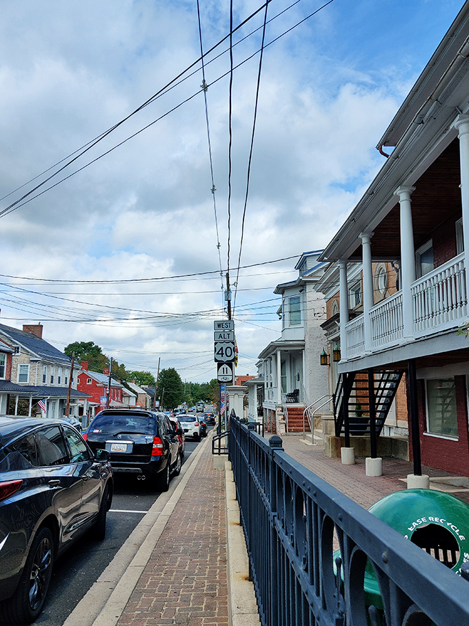 West Alt-40 cuts through town, where porches invite neighbors to sit a spell and watch the world go by.