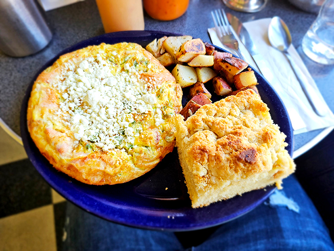 A frittata that could end wars &ndash; golden, cheese-topped perfection alongside home fries and cornbread that demands to be savored, not just eaten.