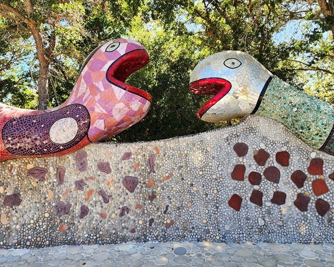 These open-mouthed mosaic creatures seem perpetually surprised by their own brilliance. Can't blame them—I'd be gawking too if I looked this good.