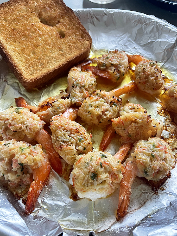 Stuffed shrimp that look like they've been to finishing school – dressed up with savory stuffing but still maintaining their Gulf Coast accent.