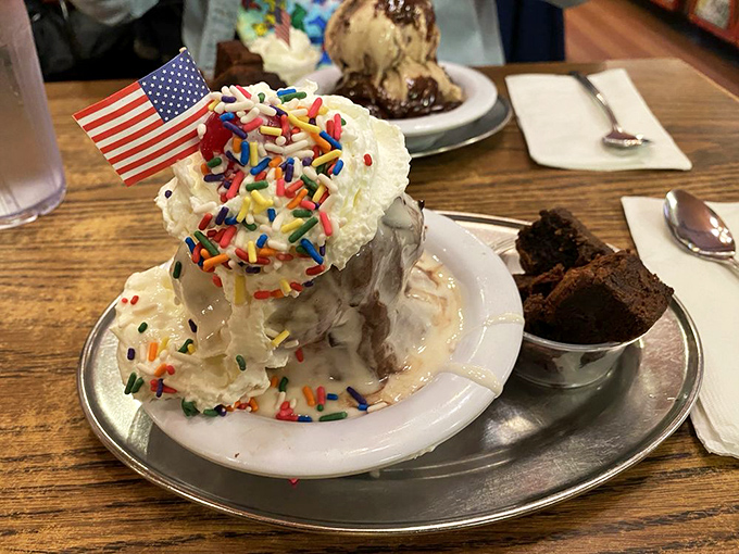 This sundae isn't wearing an American flag for show—it's patriotically declaring your constitutional right to excessive whipped cream and sprinkles.