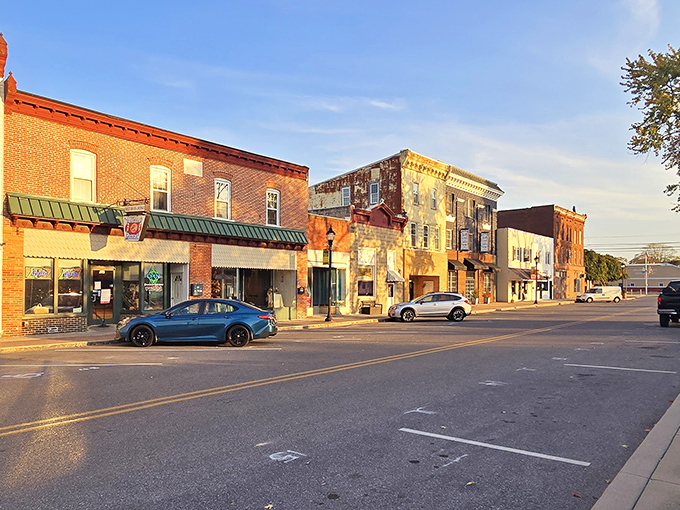 Golden hour bathes these historic storefronts in warm light, showcasing a downtown where your Social Security check goes the extra mile.