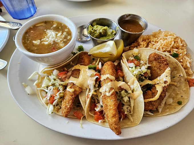 These fish tacos aren't just a meal; they're a beach vacation for your taste buds, complete with crispy cabbage waves and creamy sauce sunshine.