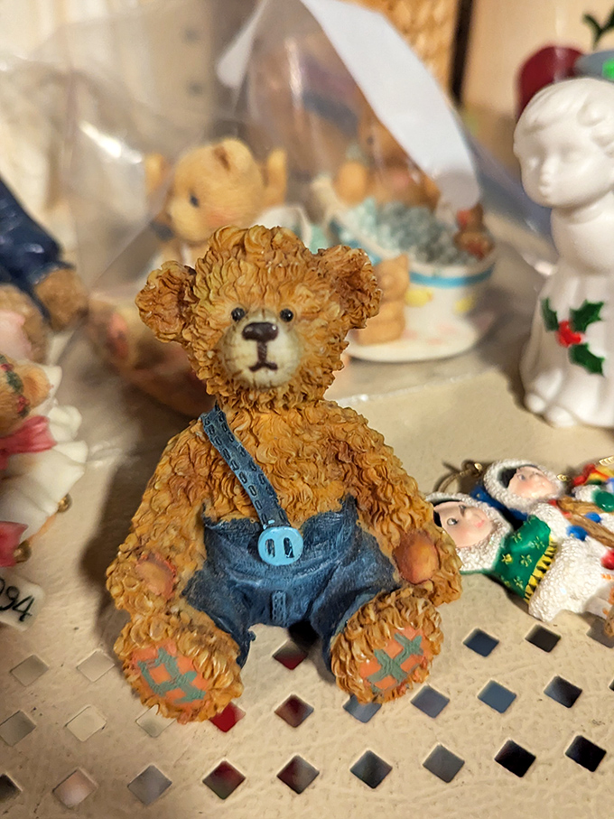 This tiny teddy in denim overalls isn't just adorable; he's patiently waiting for his second chance at being someone's cherished companion.