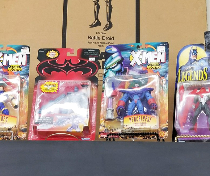 Vintage action figures that survived childhood battles now stand guard in their original packaging&mdash;nostalgia that doesn't require batteries.