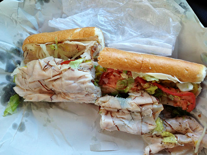 The turkey sub in all its glory&mdash;layers of thinly sliced turkey, fresh veggies, and that perfect bread. This isn't lunch; it's an edible masterpiece.
