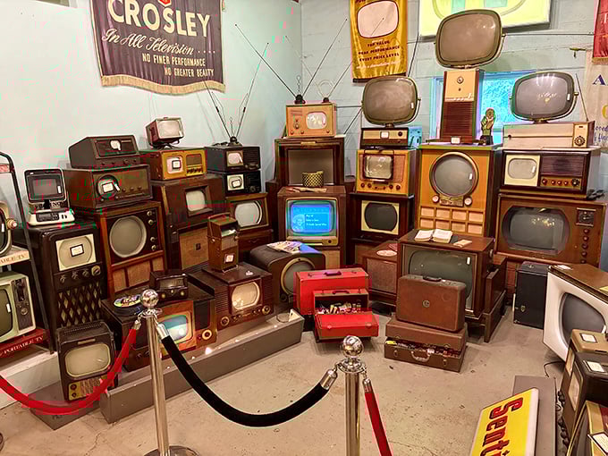 Television history stacked floor-to-ceiling! From wooden consoles to space-age designs, this collection would make any streaming service feel suddenly inadequate.