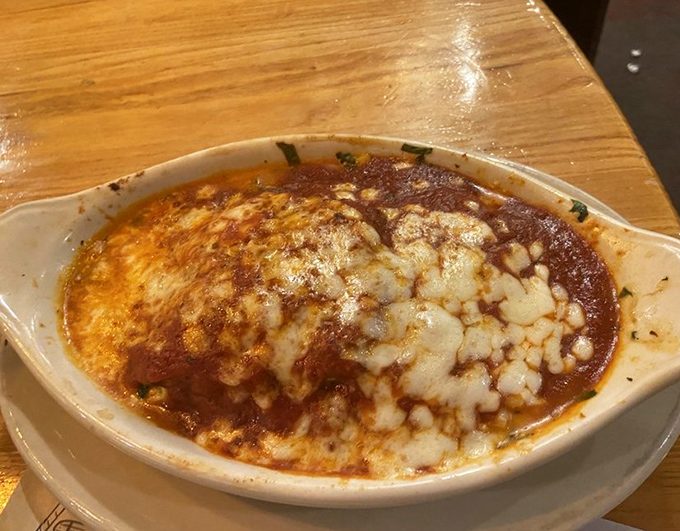 Lasagna that doesn't just sit on the plate&mdash;it beckons, bubbling with cheese and promising comfort in every forkful.