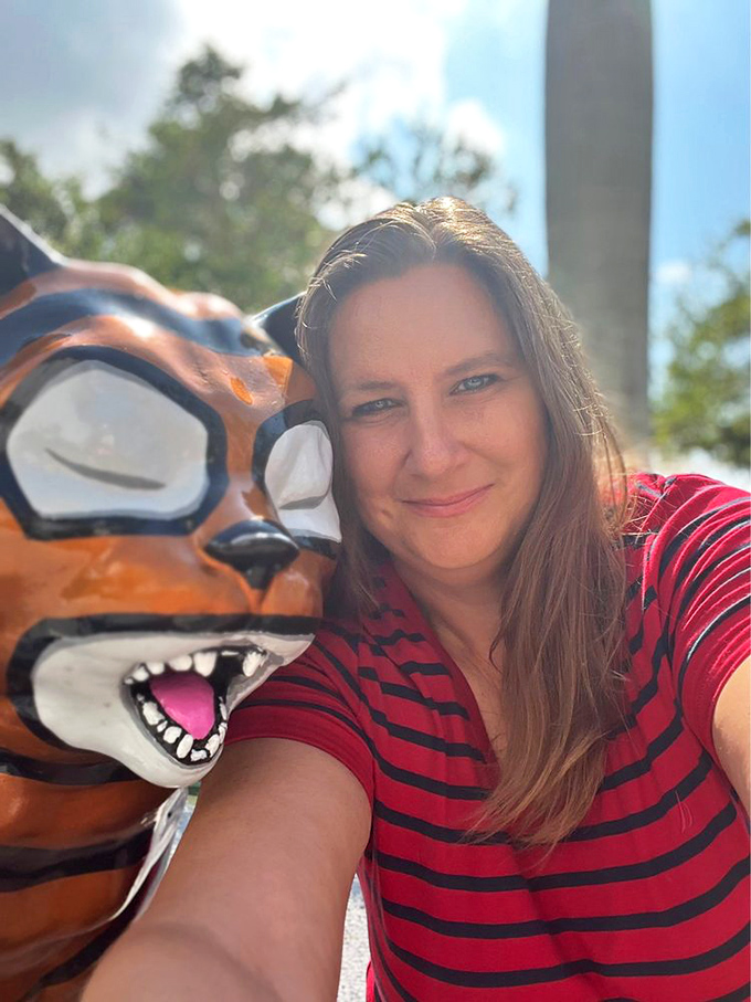 The tiger sculpture's playful expression invites visitors to reconnect with their inner child while surrounded by Miami's natural beauty.