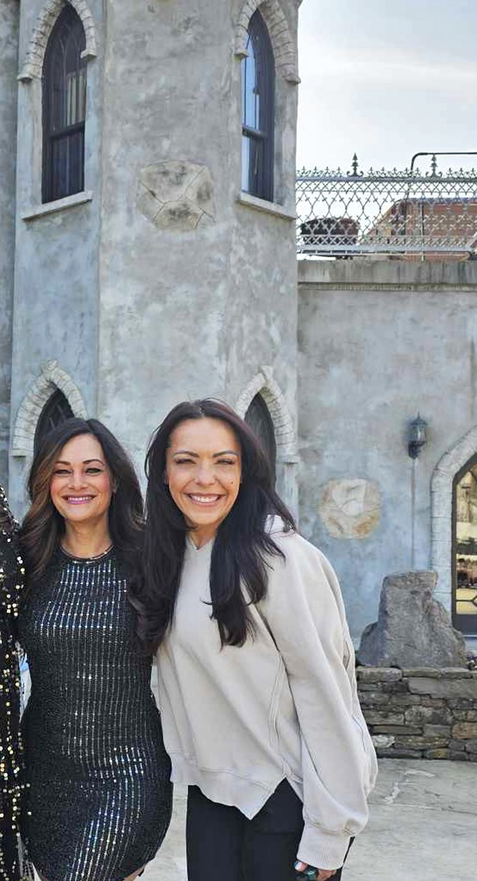 The castle provides a stunning backdrop for visitors, its stone walls and arched windows creating the perfect setting for memorable moments.