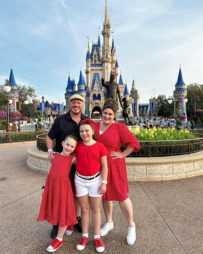 The castle provides the perfect backdrop for family memories, where coordinated outfits are optional but smiles are mandatory.