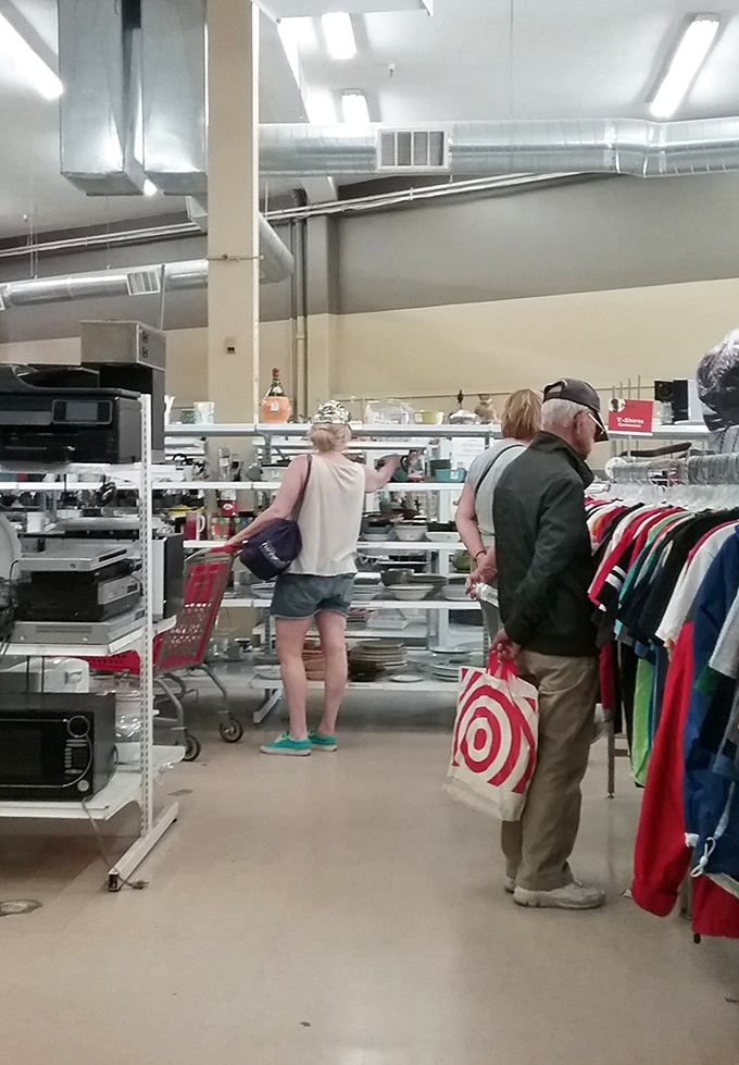 Treasure hunters in their natural habitat, scanning shelves where yesterday's kitchen appliances await their second act in California homes.