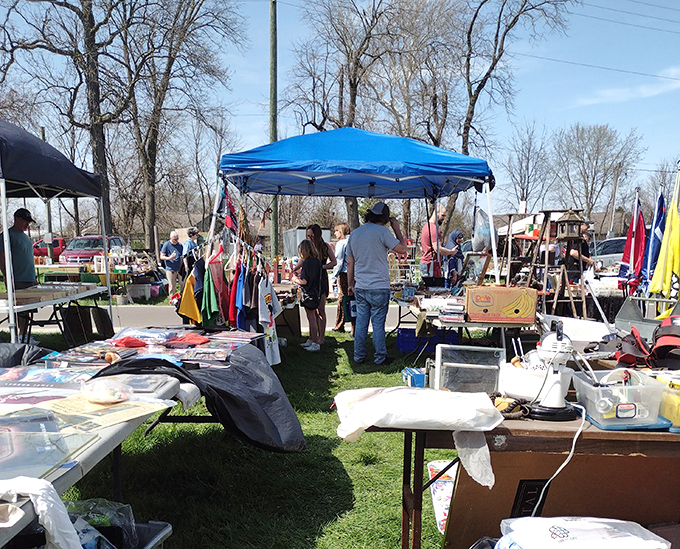 The thrill of the hunt brings shoppers of all ages together, weaving between colorful canopies and tables laden with potential treasures on a perfect spring day.