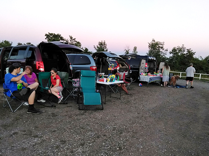 Tailgating reimagined! Families transform their vehicles into cozy living rooms, complete with snacks that would make any multiplex jealous.