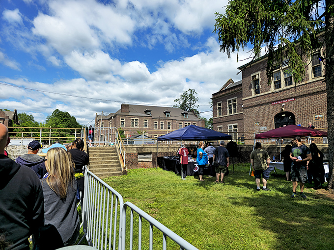 Modern visitors gather where patients once lived, the contrast between today's Halloween festivities and yesterday's realities creating a thought-provoking juxtaposition.