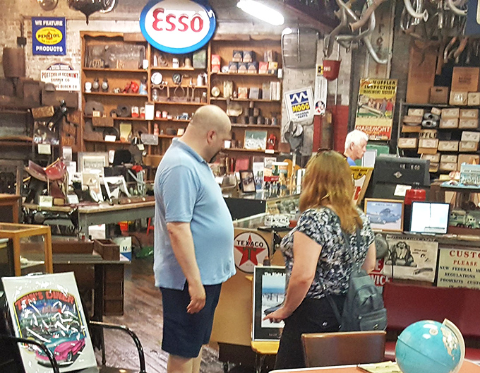 The museum's front desk area feels like stepping into your eccentric uncle's garage &ndash; if your uncle happened to collect every gas station sign since 1940.