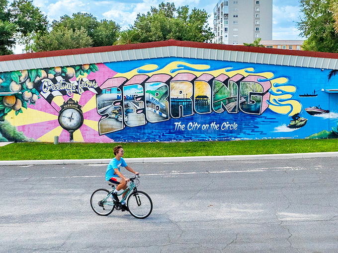 Sebring's colorful welcome mural captures the town's essence&mdash;bright, inviting, and proudly proclaiming itself "The City on the Circle" as a cyclist enjoys the quiet streets.