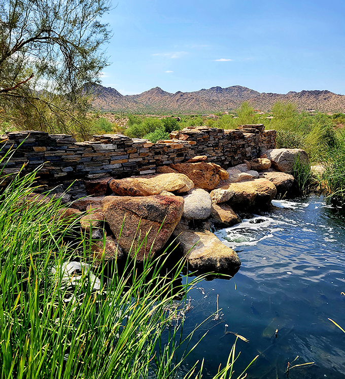 A desert oasis that feels like finding an unexpected $20 in your jeans &ndash; cool water, ancient stones, and the mountains creating nature's perfect backdrop.
