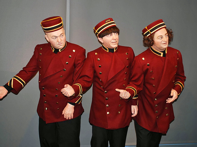 These lifelike figures in their iconic bellhop uniforms stand ready for duty – just don't ask them to carry your luggage up any stairs!