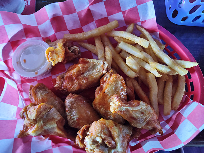 Wings that don't need a sports bar backdrop to shine. These golden-fried beauties could make a vegetarian question their life choices.
