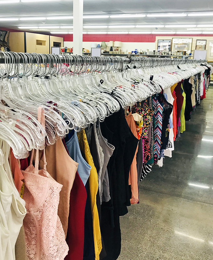 Clothing racks stretch toward the horizon like a textile rainbow, each hanger potentially holding your next favorite outfit or Halloween costume.