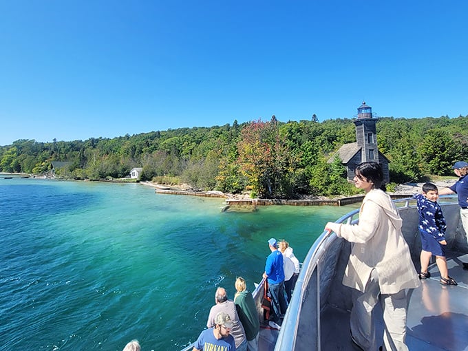 Wide-eyed visitors lean over the rail, soaking in Pictured Rocks&rsquo; turquoise waters and storybook shoreline&mdash;proof that sightseeing here is anything but ordinary.