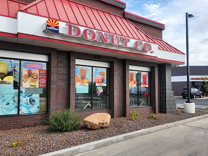 Arizona Donut Co.'s brick facade stands strong against the desert sun, protecting precious glazed treasures within.