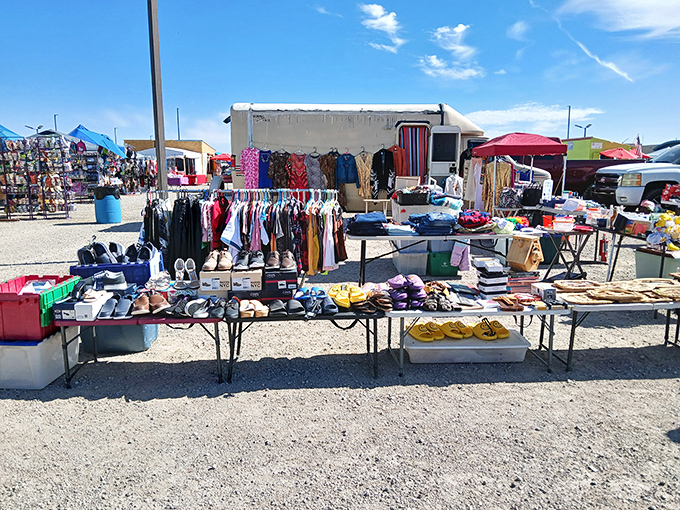 Desert winds carry the excitement of deal-hunting through this sprawling outdoor market where adventure awaits every shopper.
