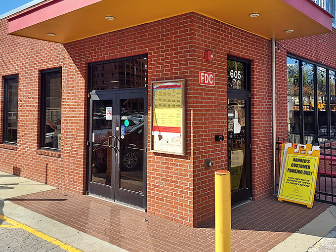 Arnold's brick facade by day transforms into a neon wonderland by night. Where Nashville's music stars and working folks unite over chicken.