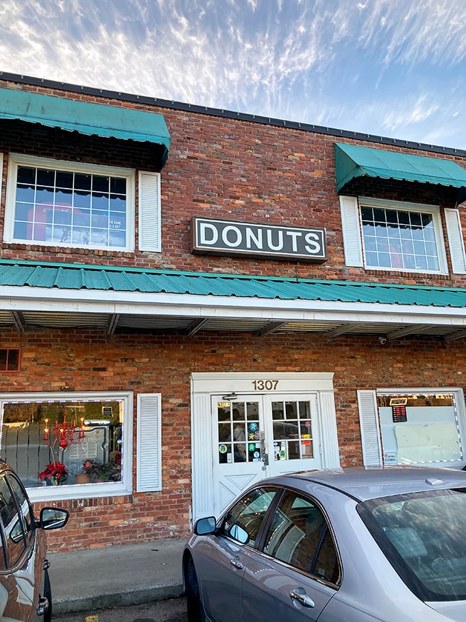 Classic brick and timeless "DONUTS" signage - proof that some things never go out of style for good reason.