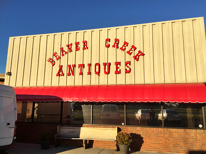 Beaver Creek Antiques announces itself with bold, carnival-style lettering. That vibrant red-and-yellow combo practically shouts "Fun finds ahead!"