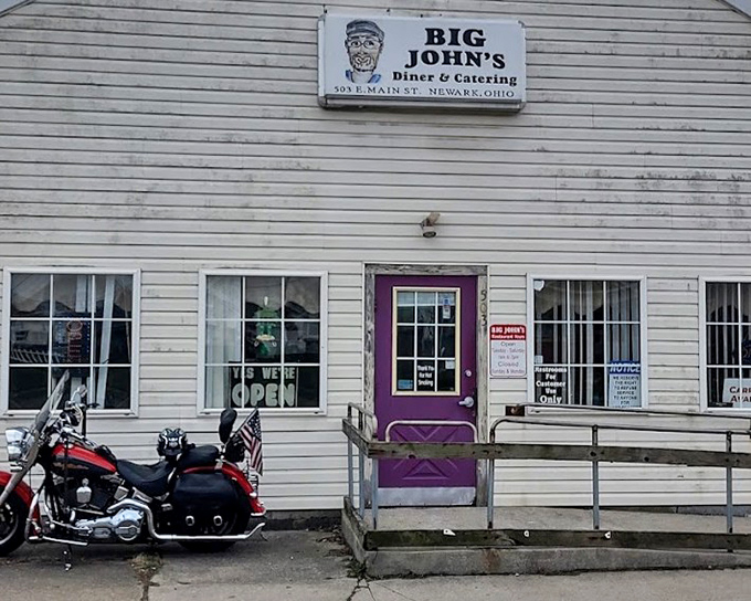Big John's purple door is like a secret entrance to comfort food paradise. No fancy frills, just honest cooking.