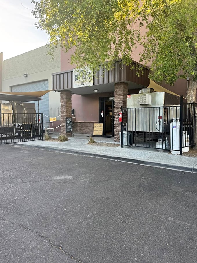 Stone and steel construction houses the kind of family barbecue that builds lasting food memories.