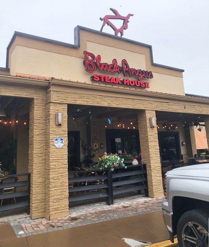 Bold red lettering announces serious steak business - no frills, just perfectly grilled meat awaits inside.