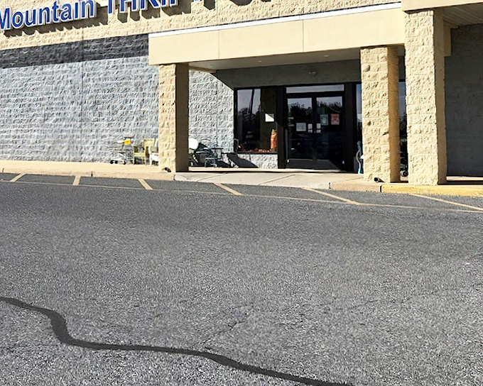 Blue Mountain Thrift Store's unassuming entrance hides a world of possibilities. Sometimes the plainest doors lead to the best discoveries.