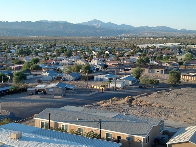 Bullhead City spreads out like a comfortable quilt beneath towering mountain guardians.
