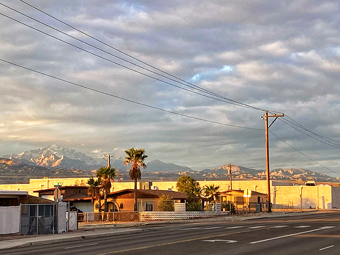 Bullhead City: Evening glow hits the palms just right, turning an ordinary strip into something halfway between postcard and memory.