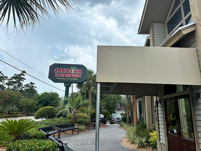 Carolina Roadhouse's distinctive signage beckons hungry diners with the promise of flame-grilled perfection and Southern hospitality at its finest.