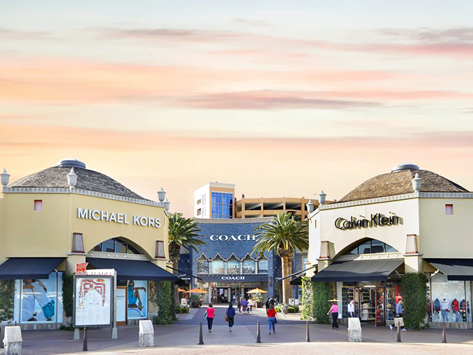 That Citadel tower sign is basically a lighthouse guiding lost shoppers to the promised land of deals.