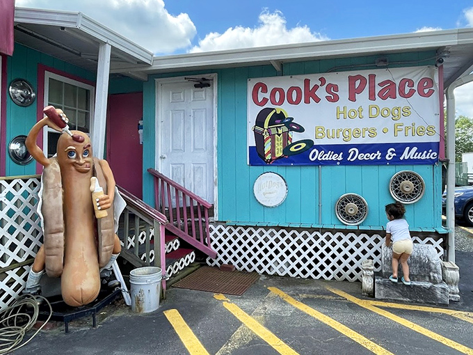 A giant hot dog greets visitors like an old friend with open arms.