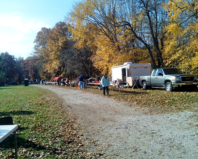 Autumn leaves frame this outdoor market like nature's own decorating committee showed up.