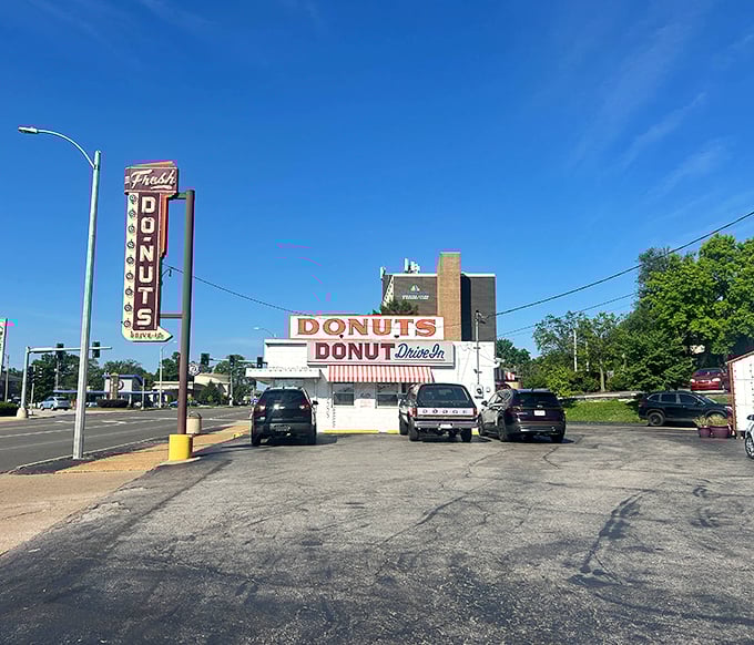This classic drive-in design screams vintage Americana - where donuts and nostalgia meet perfectly.