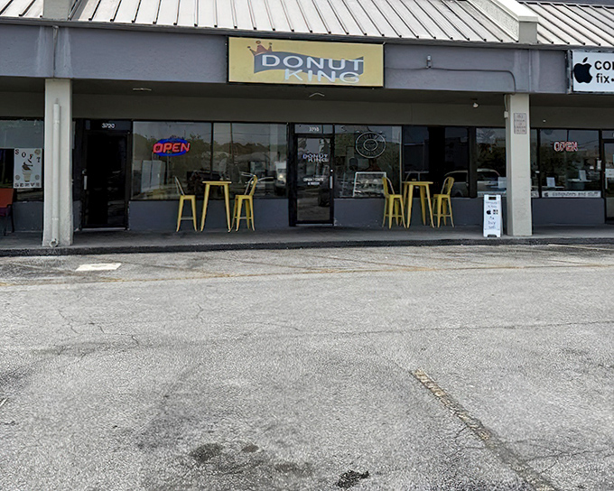 Those bright yellow stools invite you to sit a spell and savor donuts fit for royalty.