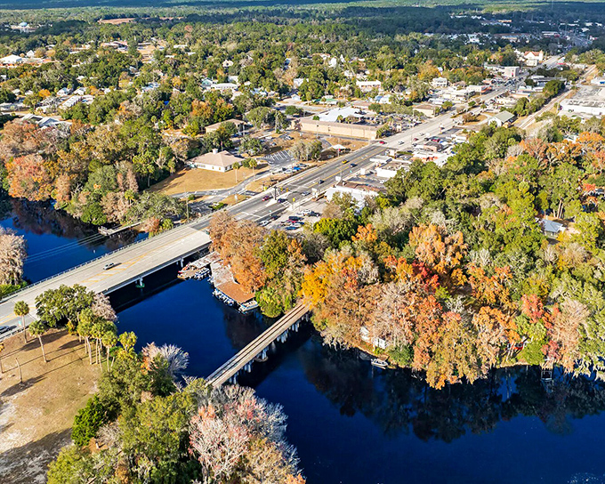 This peaceful riverfront scene makes you wonder why anyone fights traffic to crowded beaches when this exists.