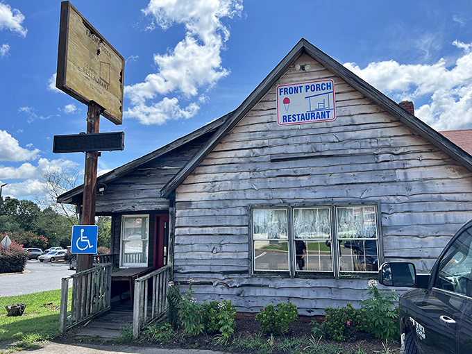 Weathered wood and simple signs - Front Porch looks exactly like where grandma would take you for Sunday dinner.