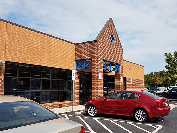That distinctive brick architecture with blue accents makes this Goodwill look more upscale than some regular retail stores.