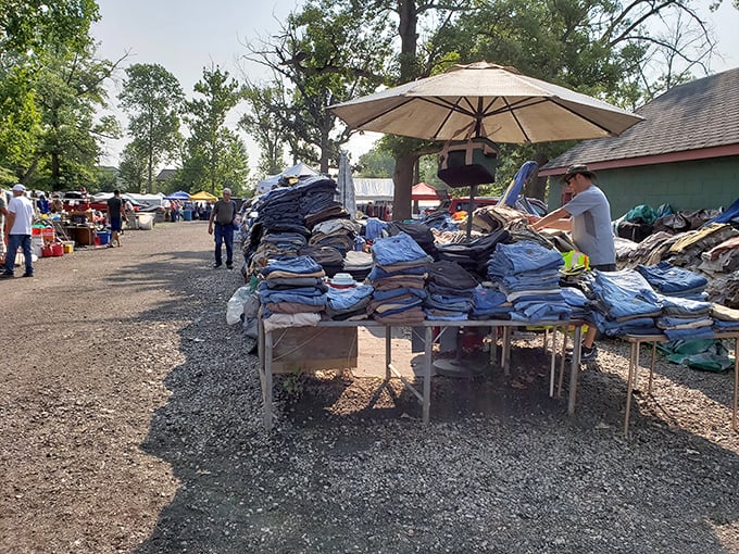 Tables overflowing with clothing treasures prove that one person's closet cleanout becomes another's fashion goldmine.