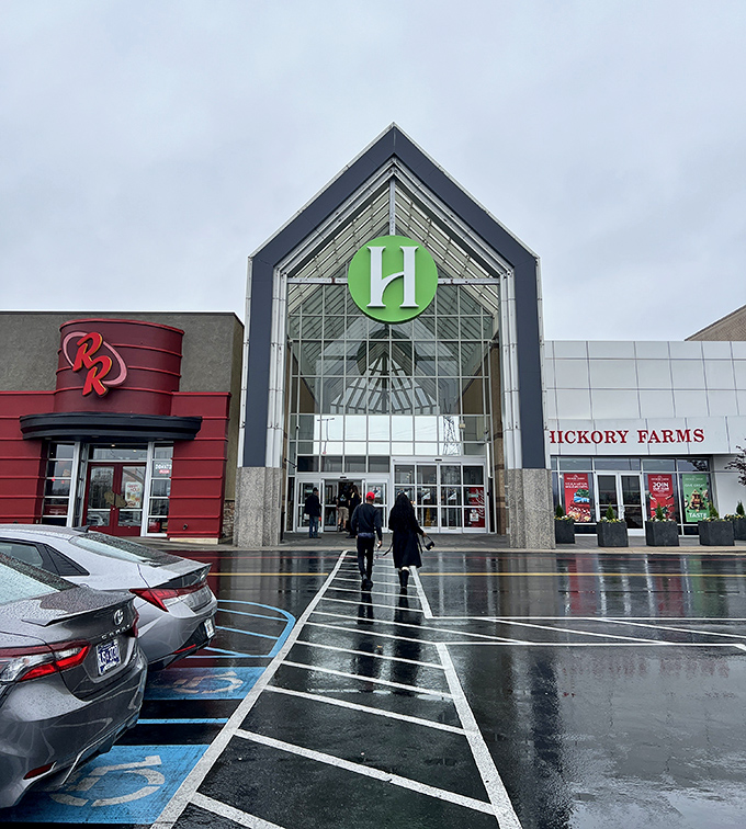 Hamilton Place rises like a retail cathedral, promising salvation through seriously good shopping deals.